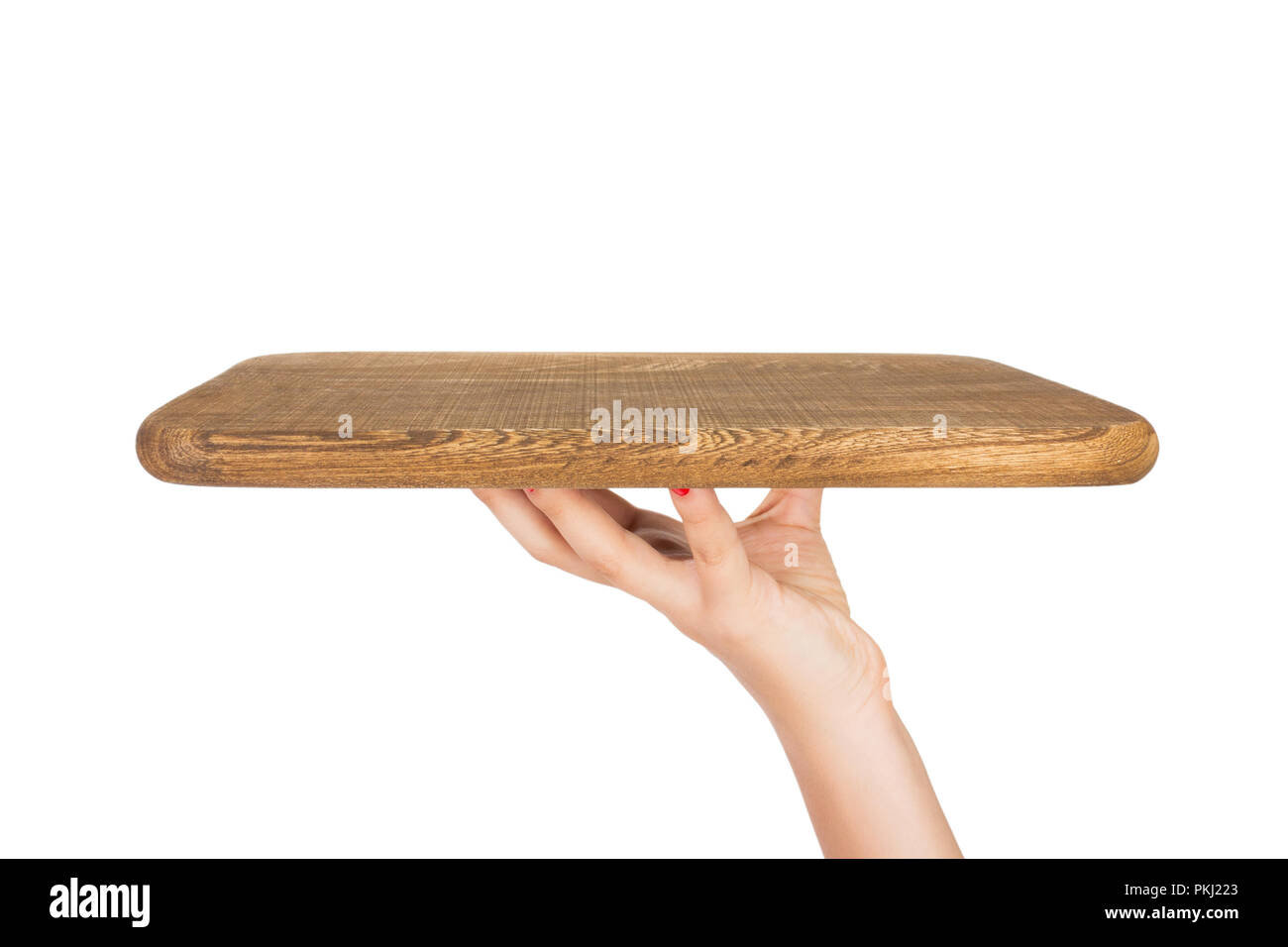 Hand holding wooden board isolated on white background with copy space ...