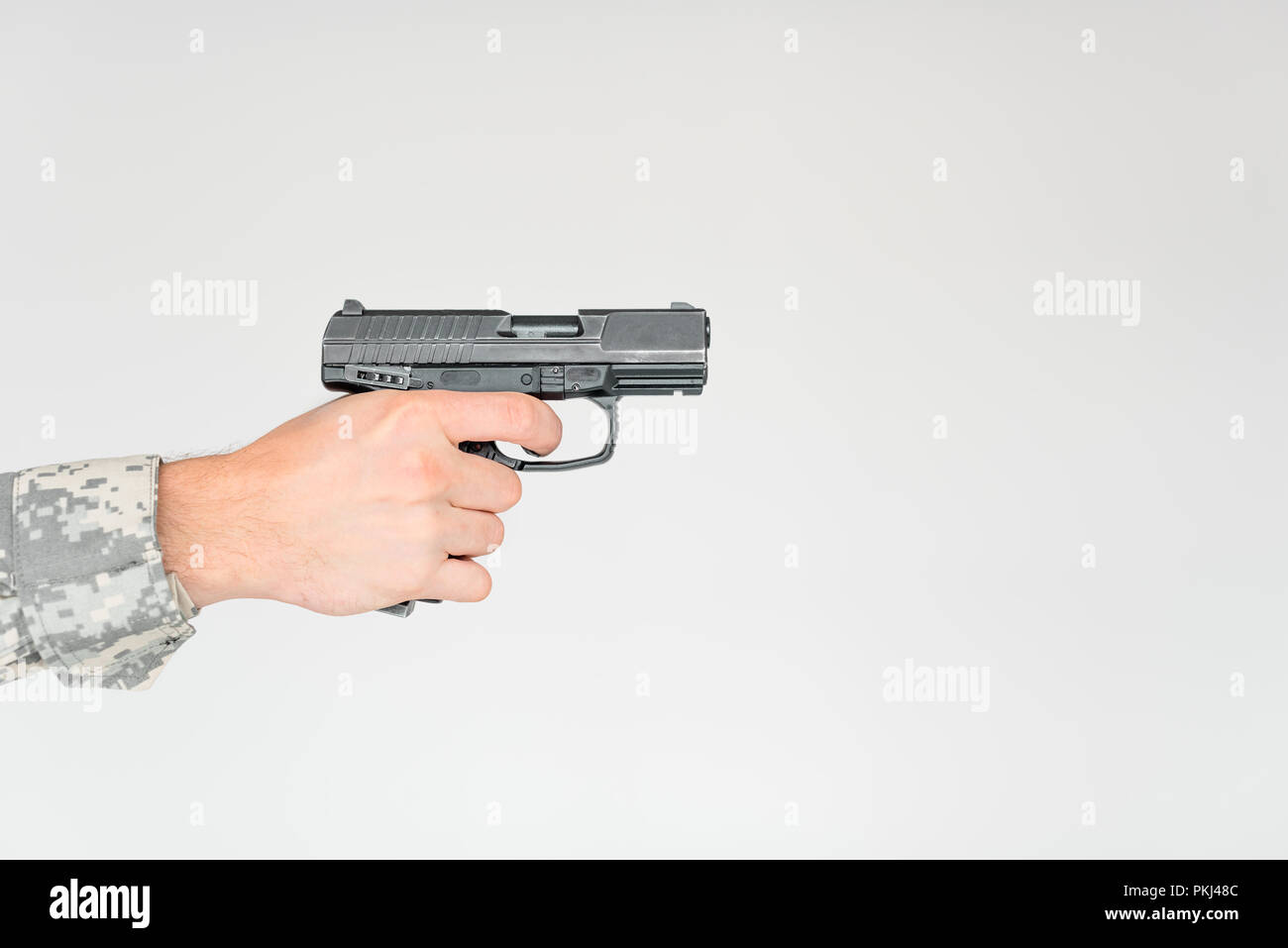 Soldier holding gun hi-res stock photography and images - Alamy