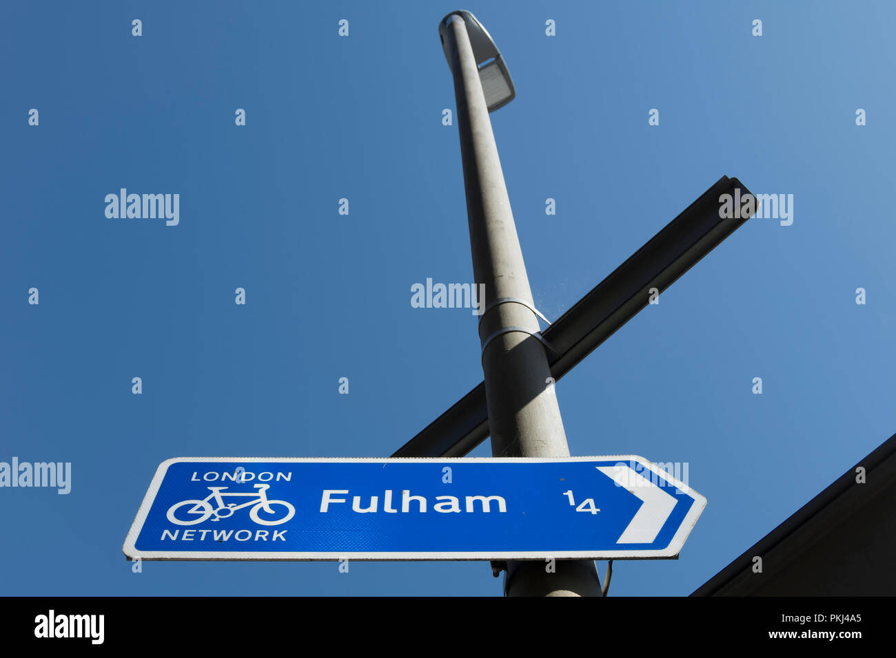 london cycle network sign showing direction and distance to fulham, in ...