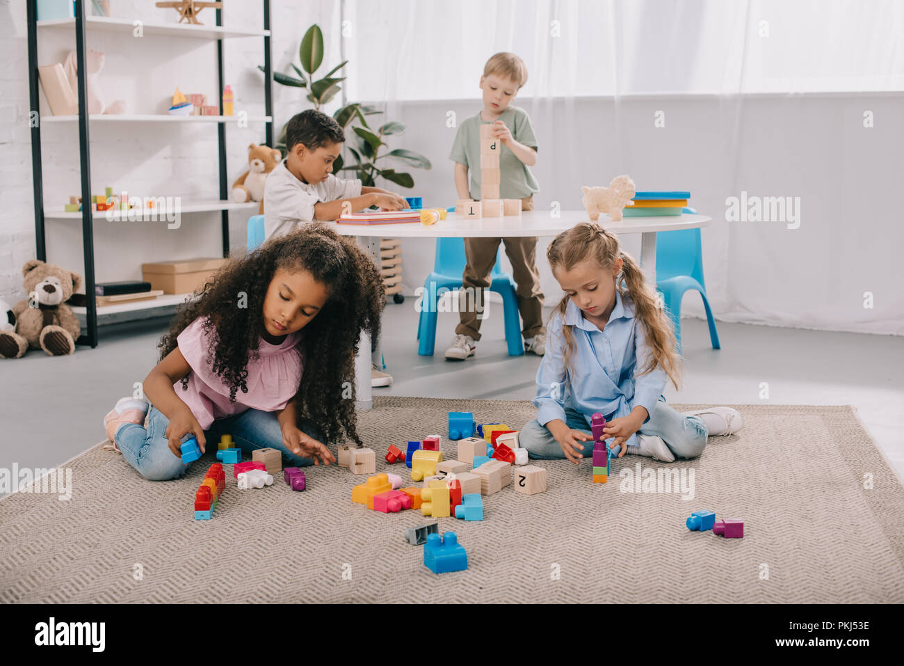 Preschoolers playing hi-res stock photography and images - Alamy