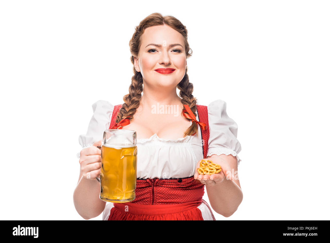 oktoberfest waitress in traditional german dress holding little ...