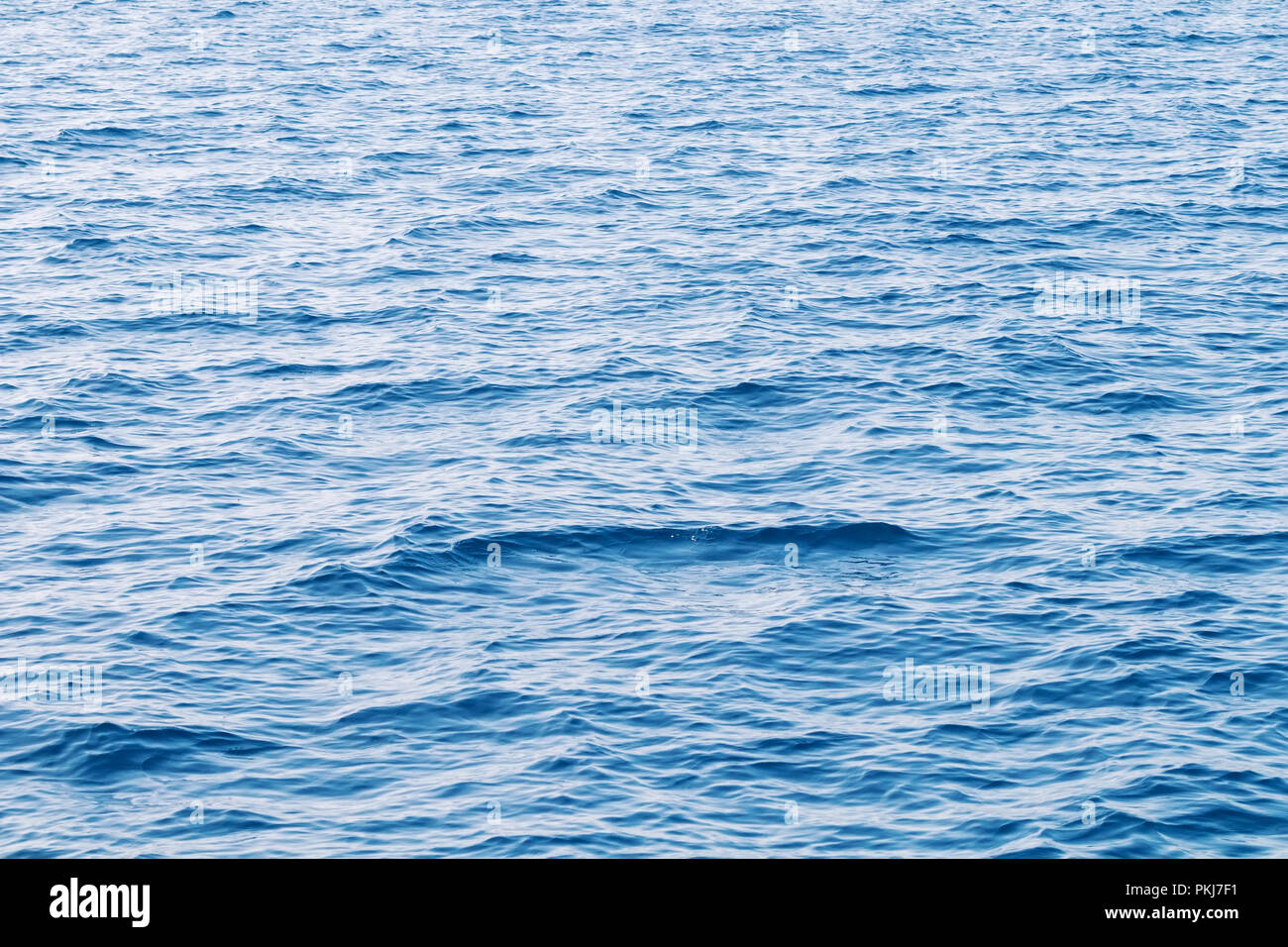 Ocean water surface background Stock Photo - Alamy