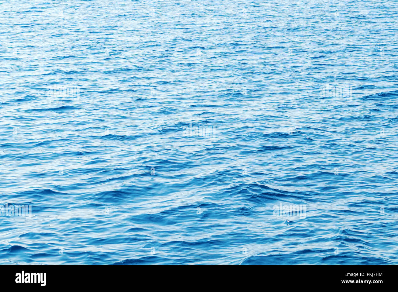 Ocean water surface background Stock Photo - Alamy