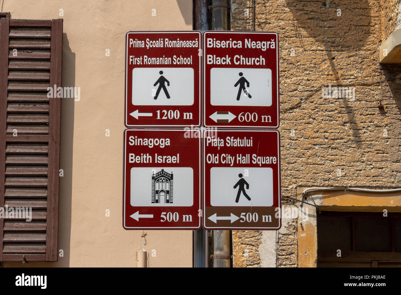 Generic tourist signs to major tourist attractions in Brasov, Romania ...