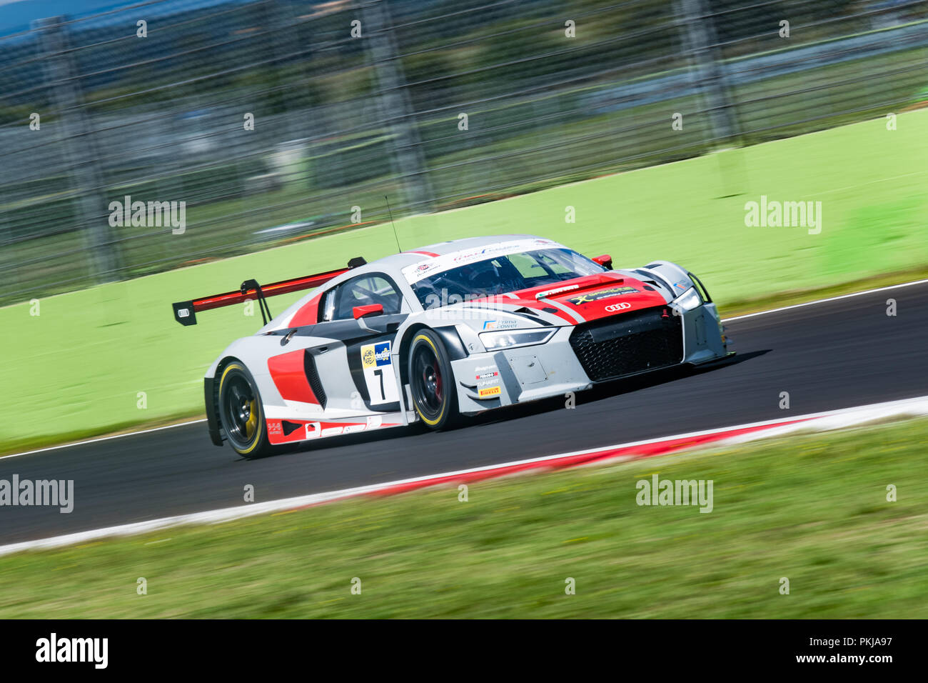 Full length of Audi car in action at turn on circuit Stock Photo - Alamy