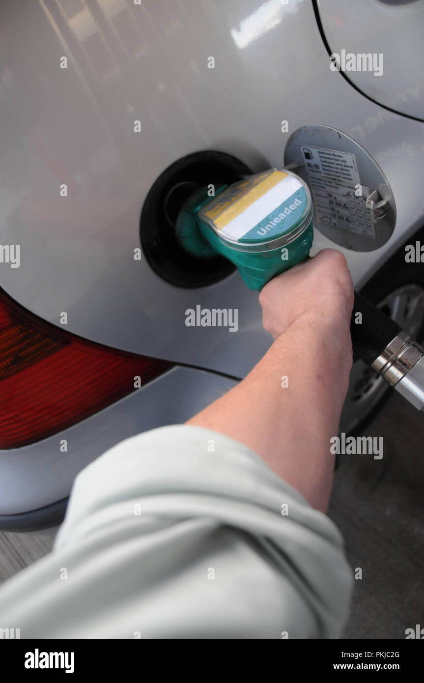 Filling up with unleaded petrol, London, UK Stock Photo - Alamy