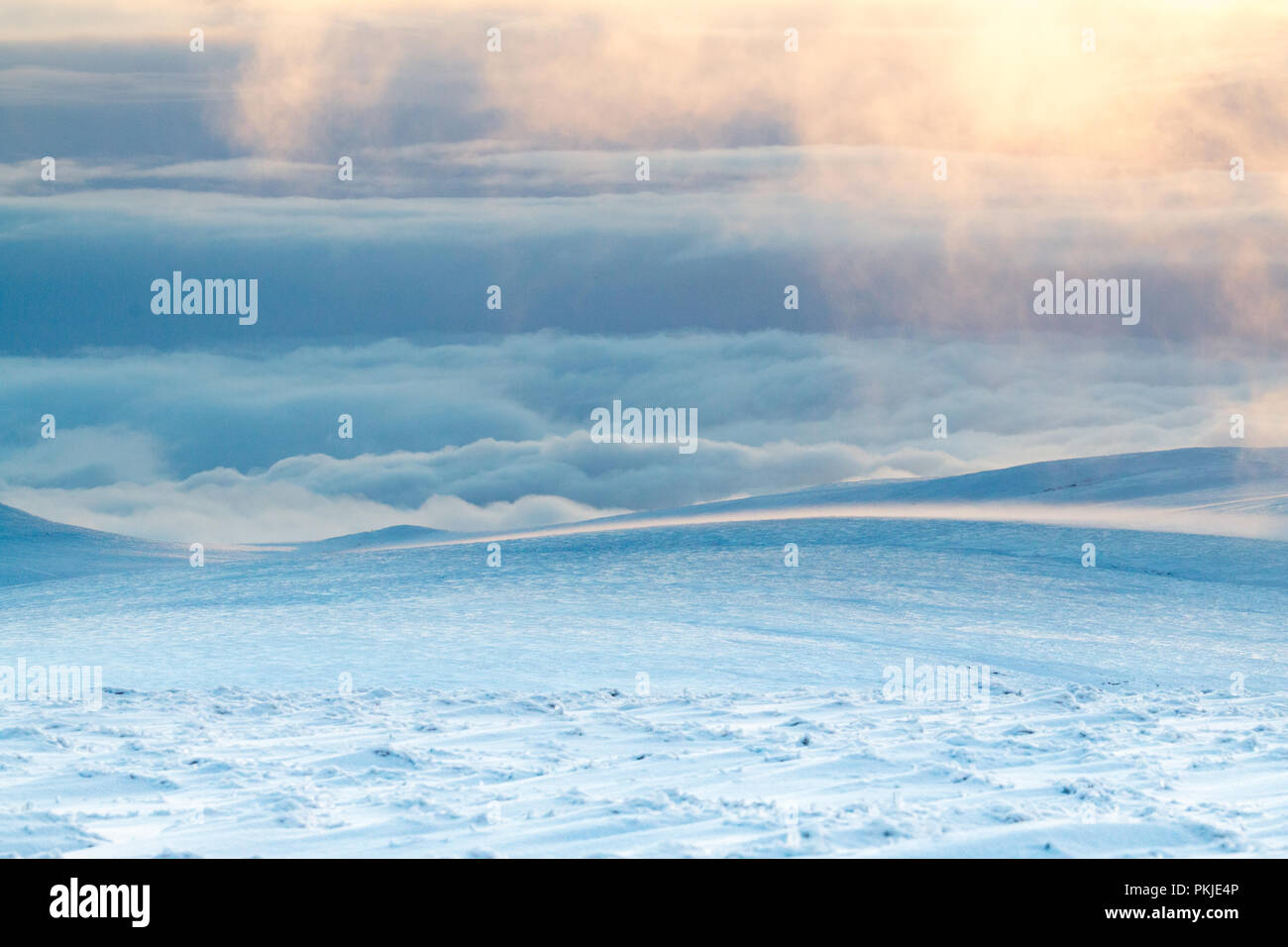 The view from Bleaklow towards Manchester and Glossop over snow covered ...