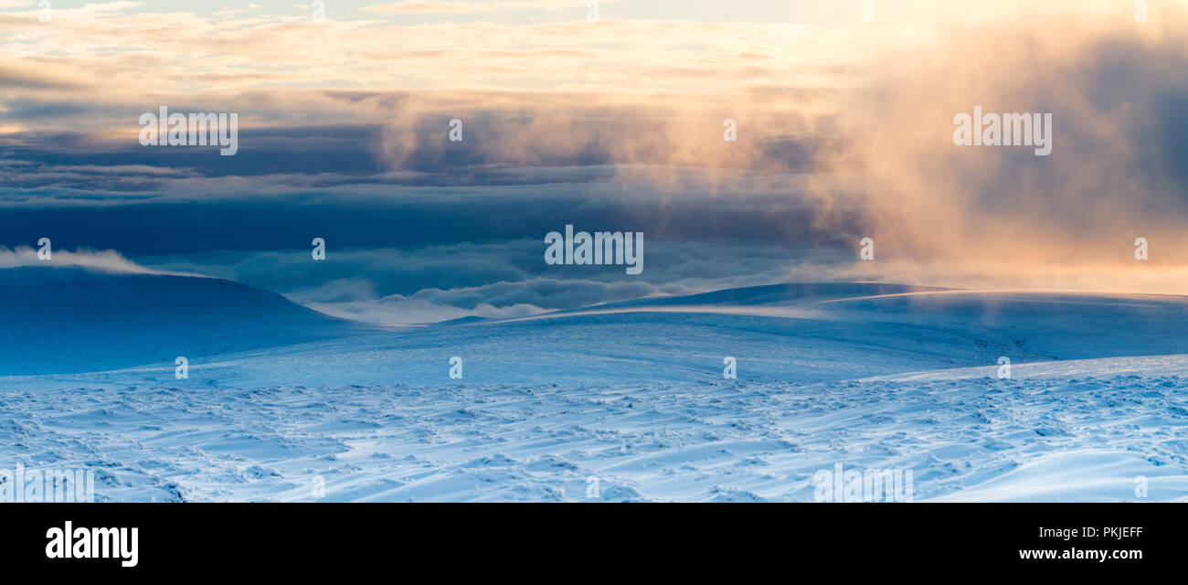 The view from Bleaklow towards Manchester and Glossop over snow covered ...