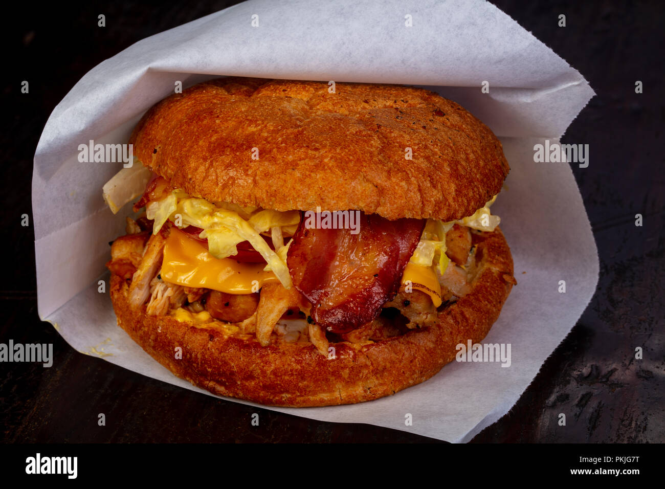 Bugrer with chicken and bacon Stock Photo - Alamy