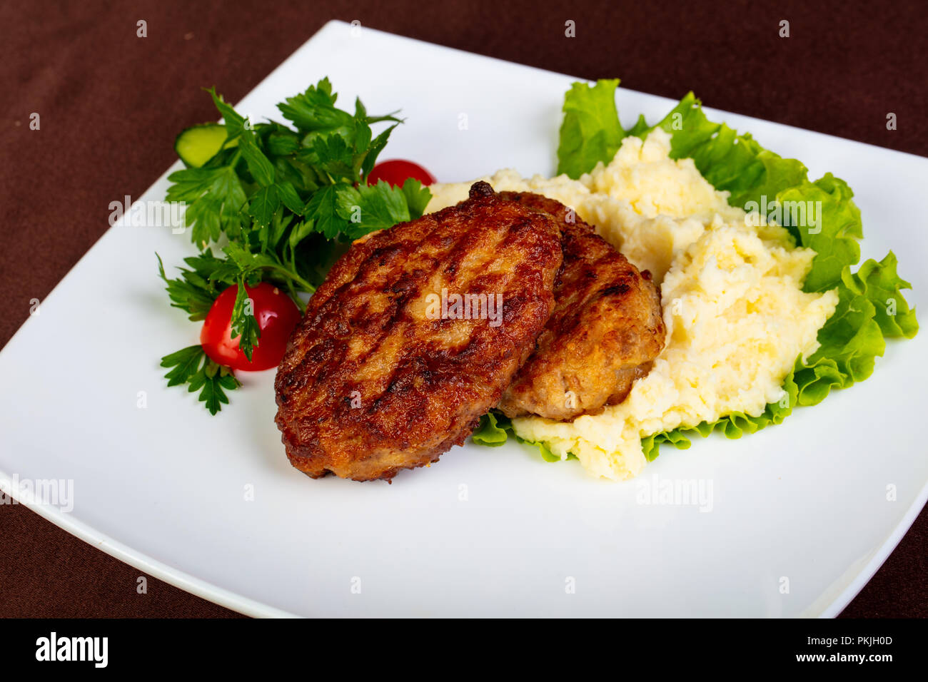 Minced meat cutlet with mashed potato Stock Photo - Alamy