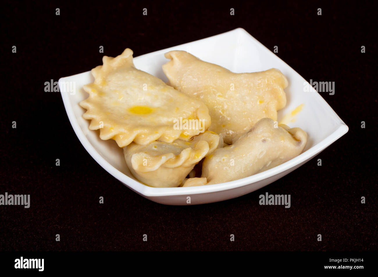 Ukrainian dumplings - vareniki with potato Stock Photo - Alamy