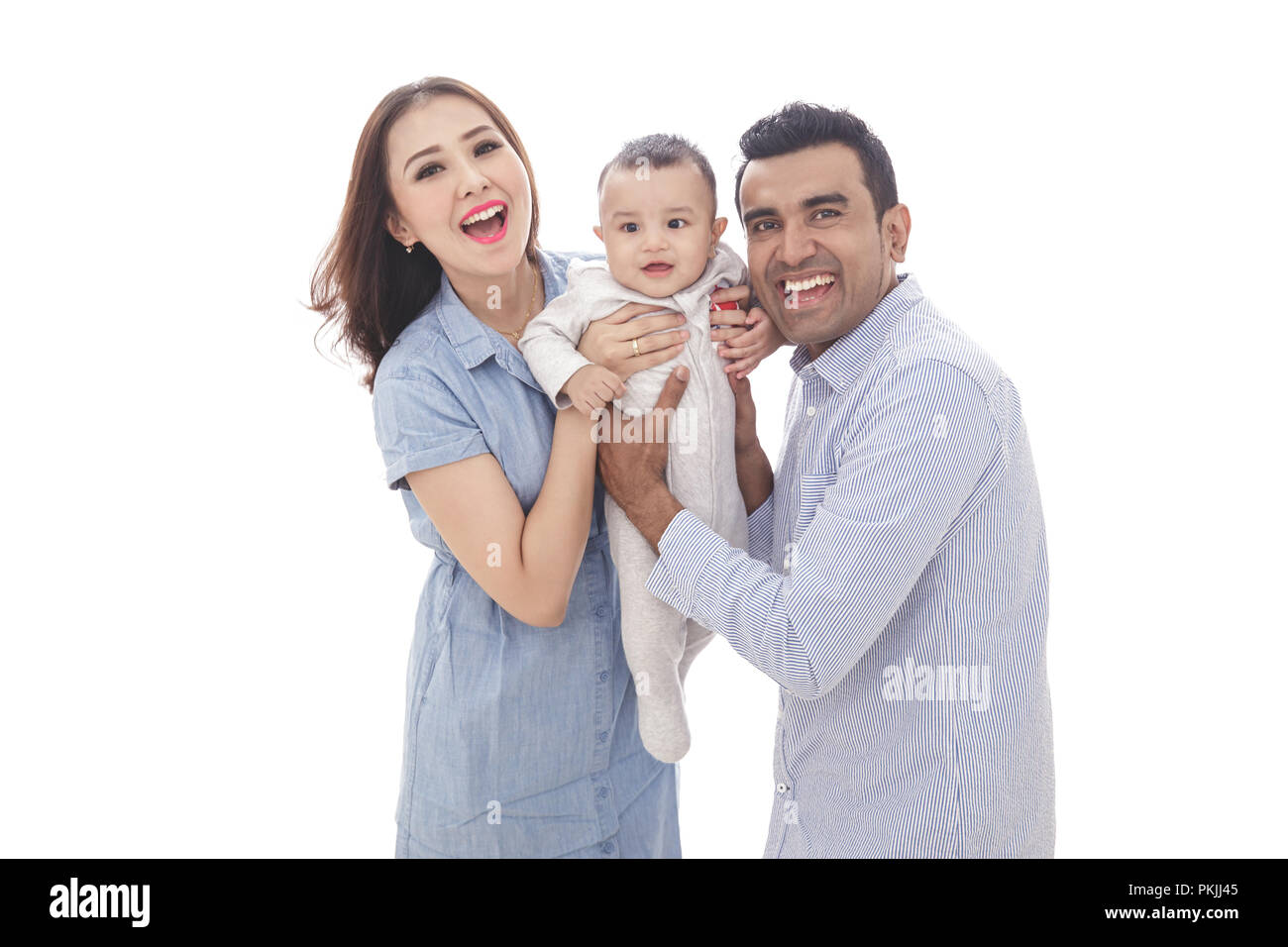 expressive parents with their cute son Stock Photo - Alamy