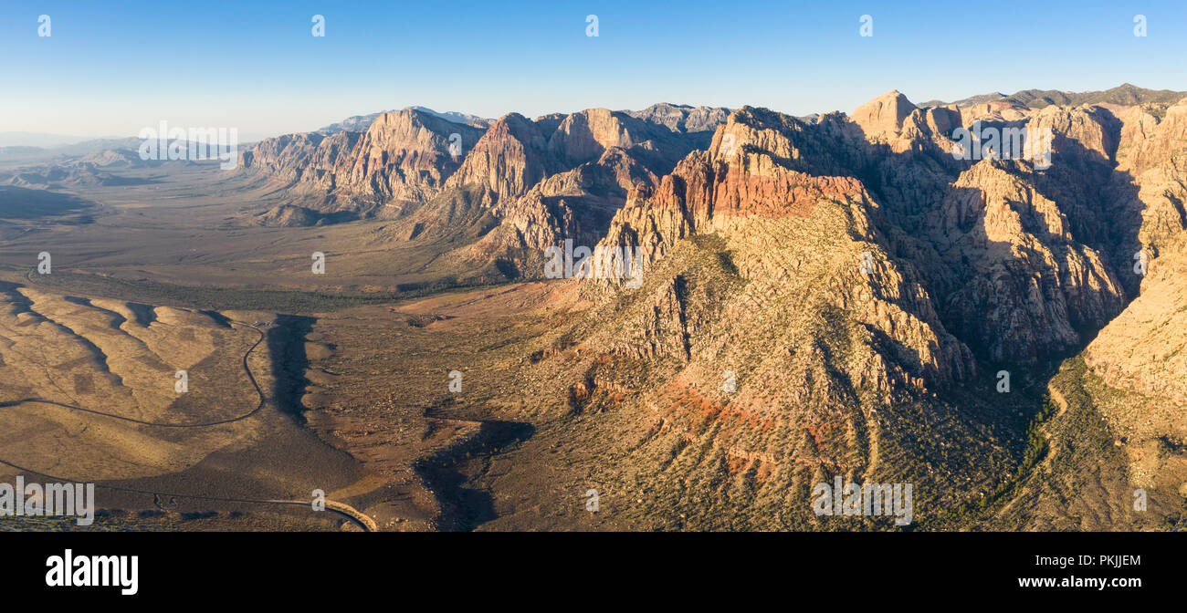 Early light shines on the massive geologic formations in Red Rock ...