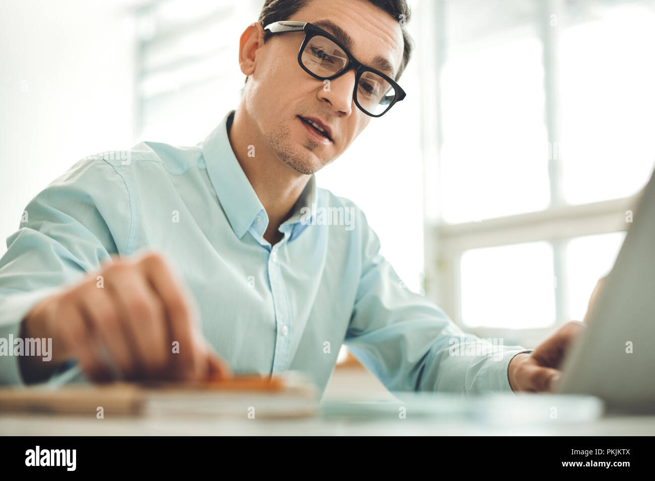 Progressive young man using hi-res stock photography and images - Alamy
