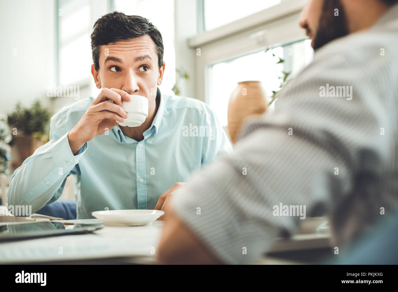 Team leader drinking coffee meeting hi-res stock photography and images - Alamy