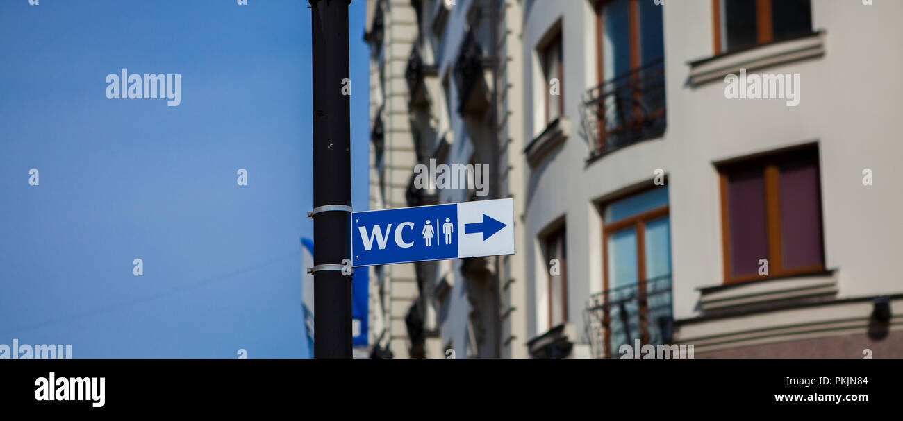 WC sign in old town. Toilet sign in European city Stock Photo - Alamy