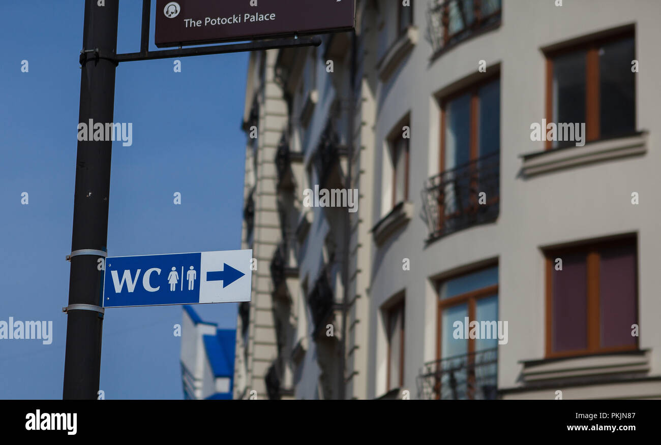 WC sign in old town. Toilet sign in European city Stock Photo - Alamy