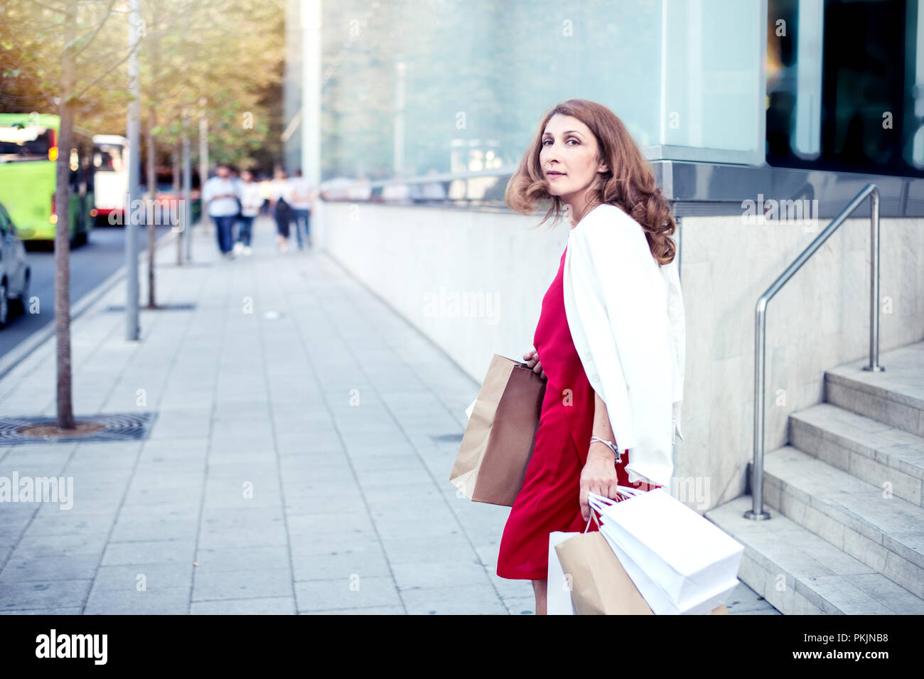 Happy girls out shopping at the mall hi-res stock photography and ...