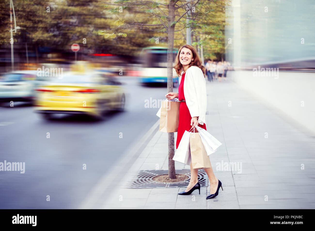 Happy girls out shopping at the mall hi-res stock photography and ...