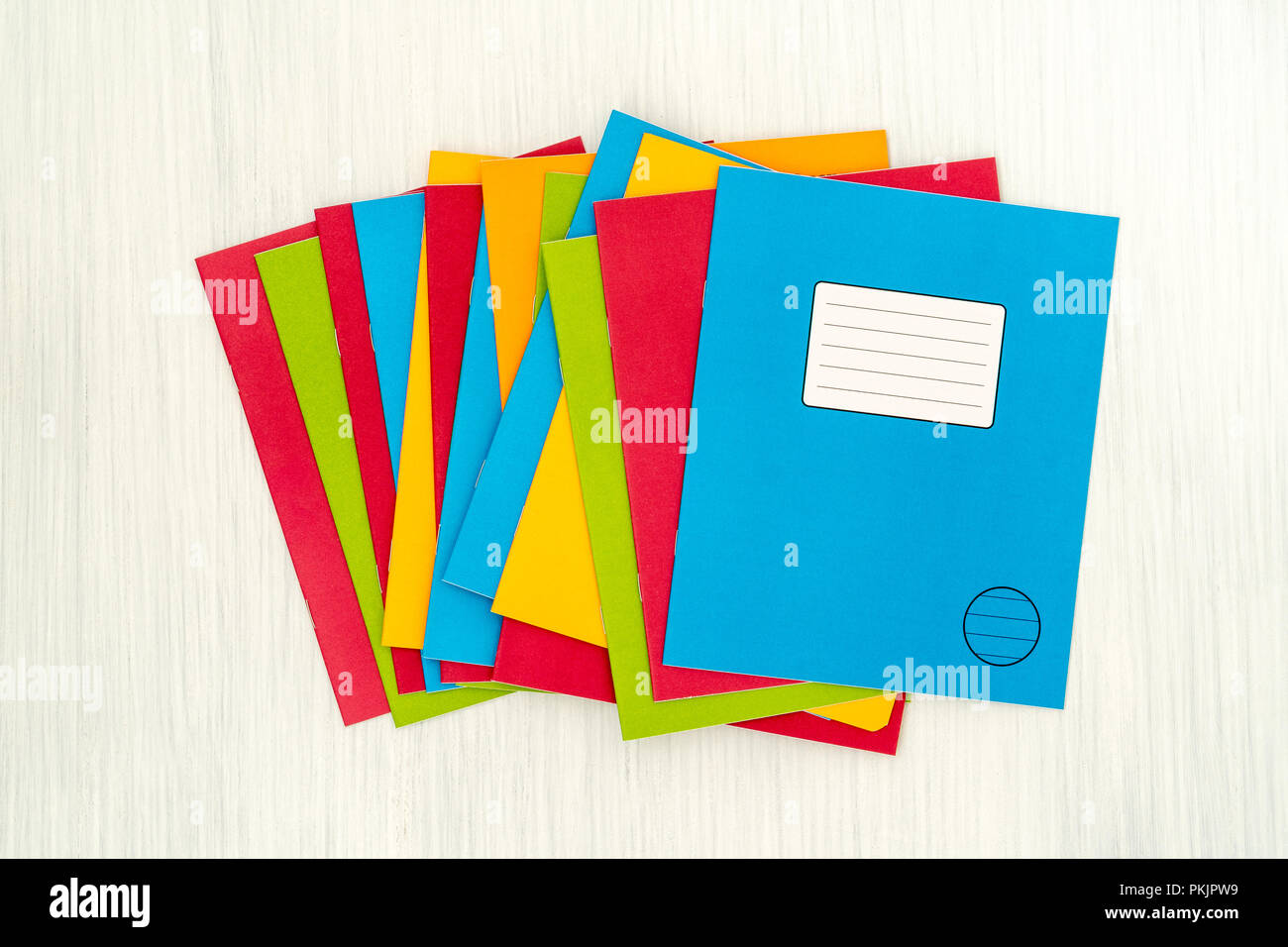 Pile of exercise books hi-res stock photography and images - Alamy