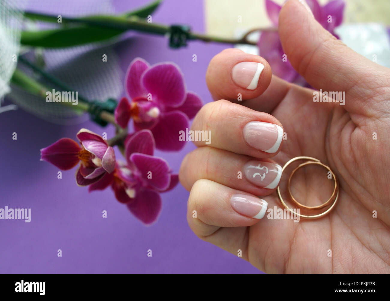 25th wedding anniversary old wedding rings Stock Photo - Alamy