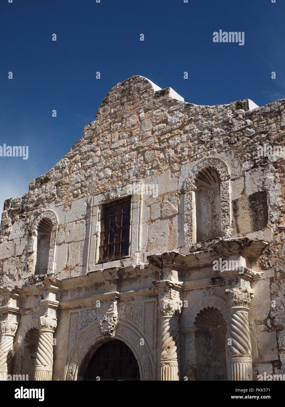 Façade of the Alamo Mission in San Antonio, Texas with a clear blue sky ...