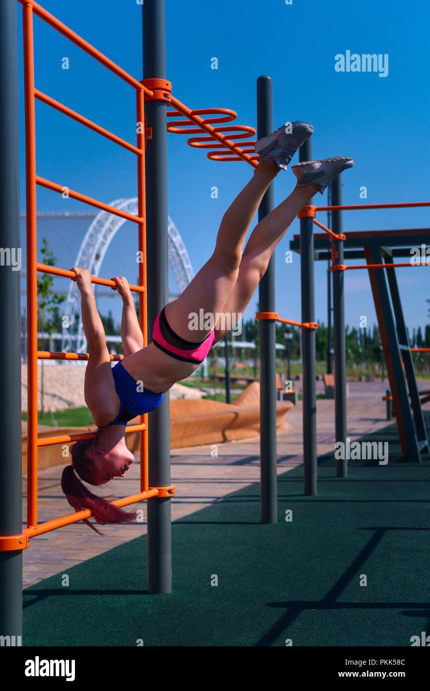Hanging upside down by feet hi-res stock photography and images - Alamy