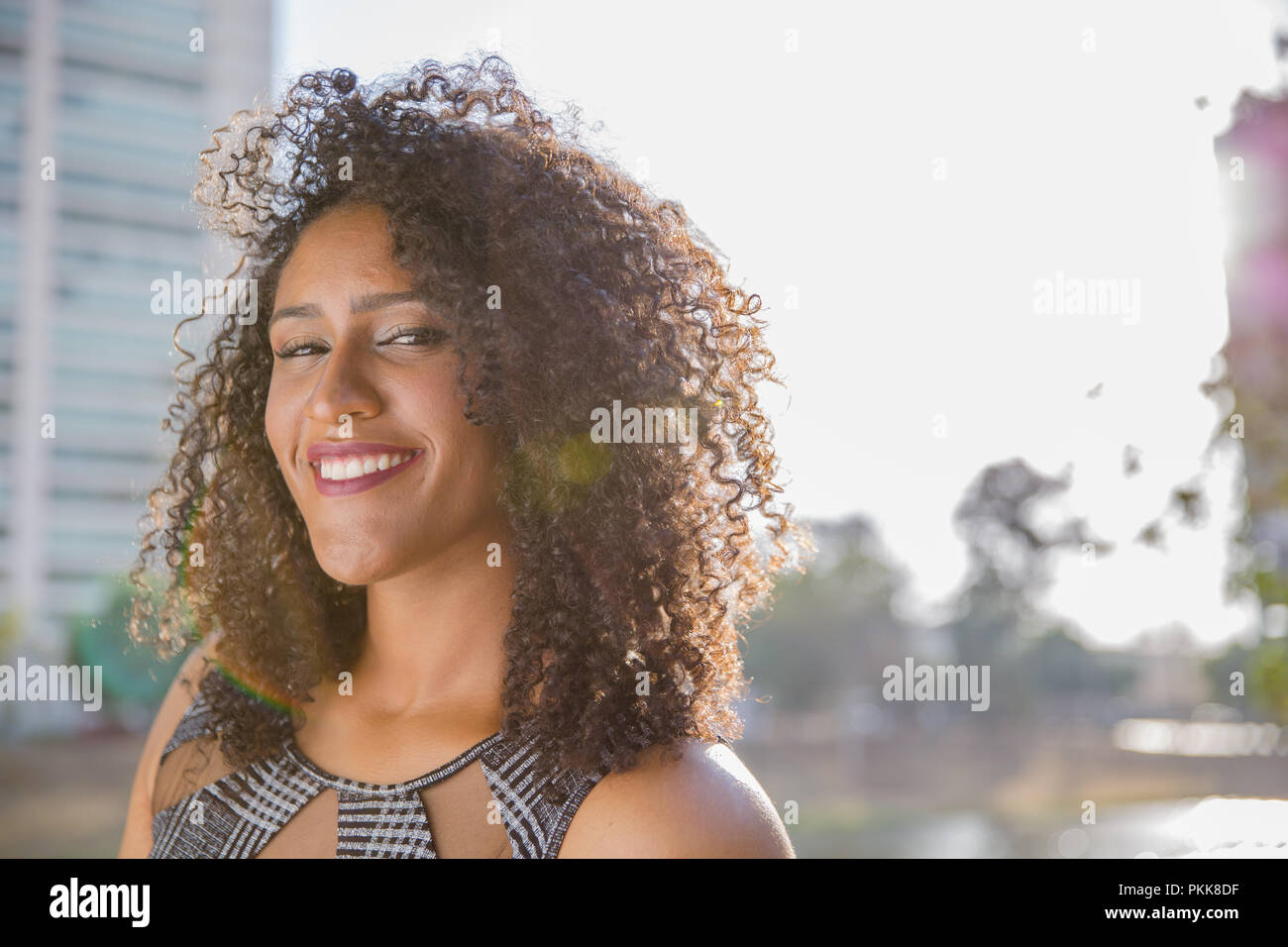 Portrait of smiling young black woman Stock Photo - Alamy Portrait of smiling young black woman Stock Photo - Alamy
