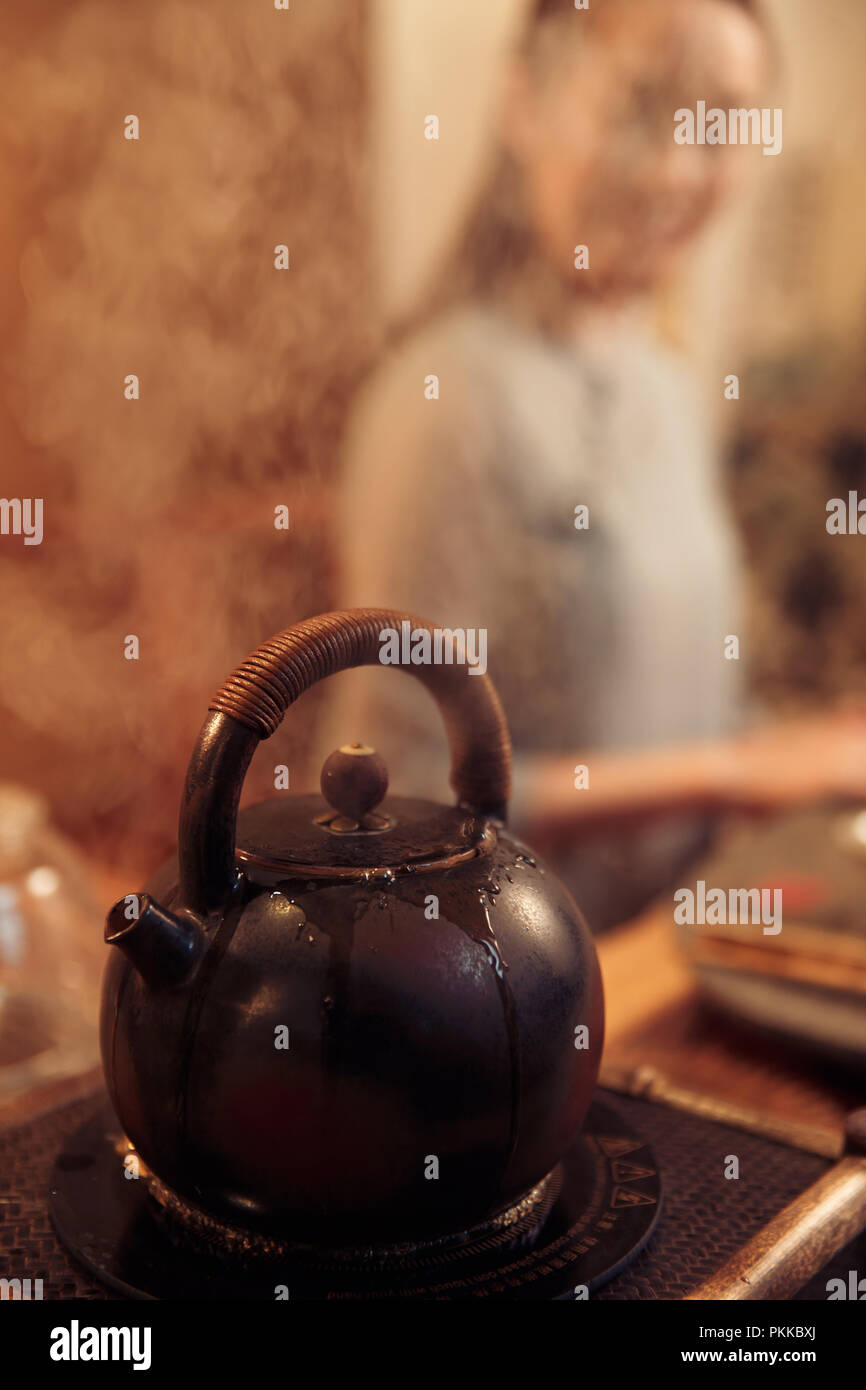Young women make tea Stock Photo - Alamy