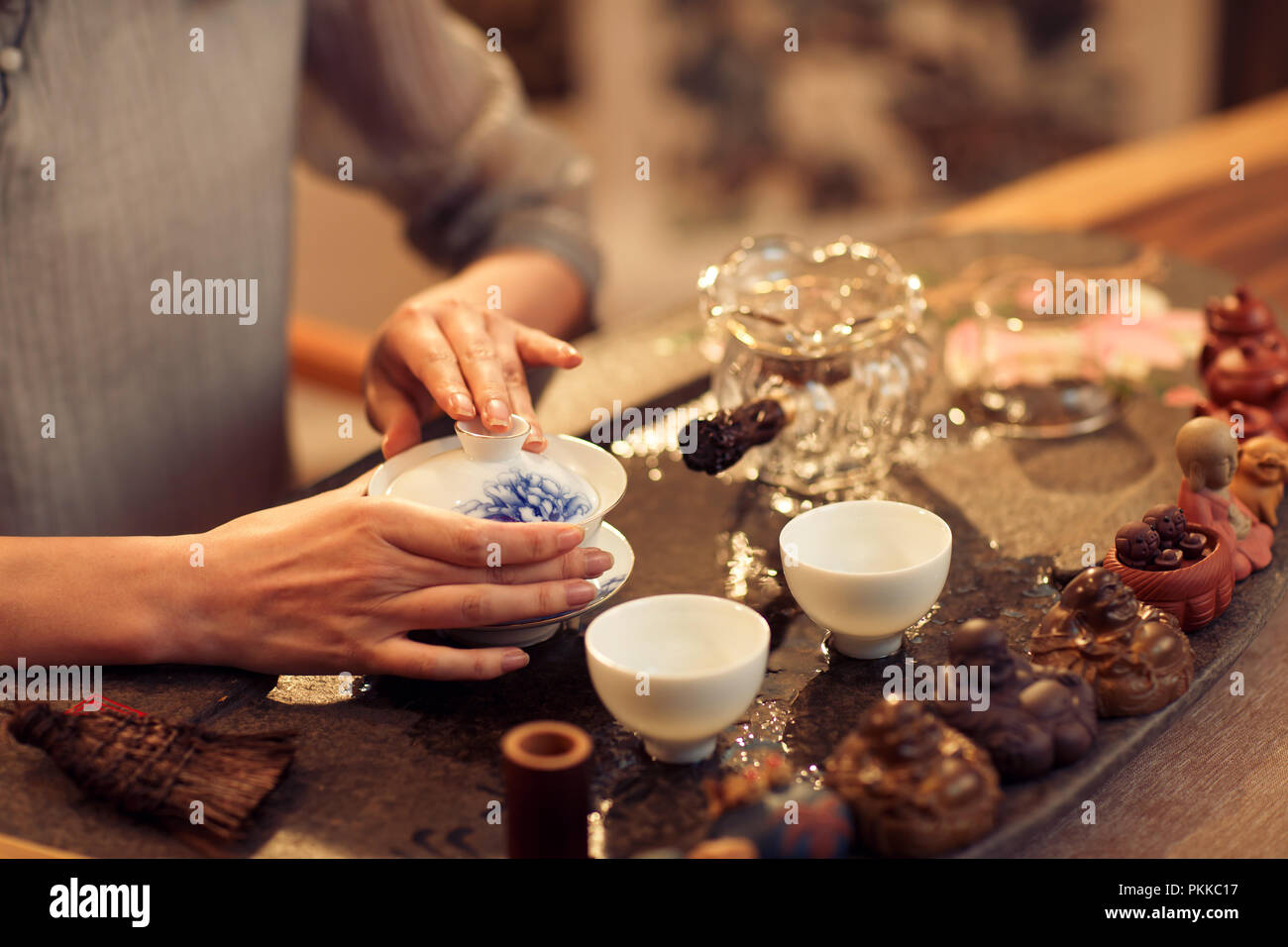 Young women make tea Stock Photo - Alamy