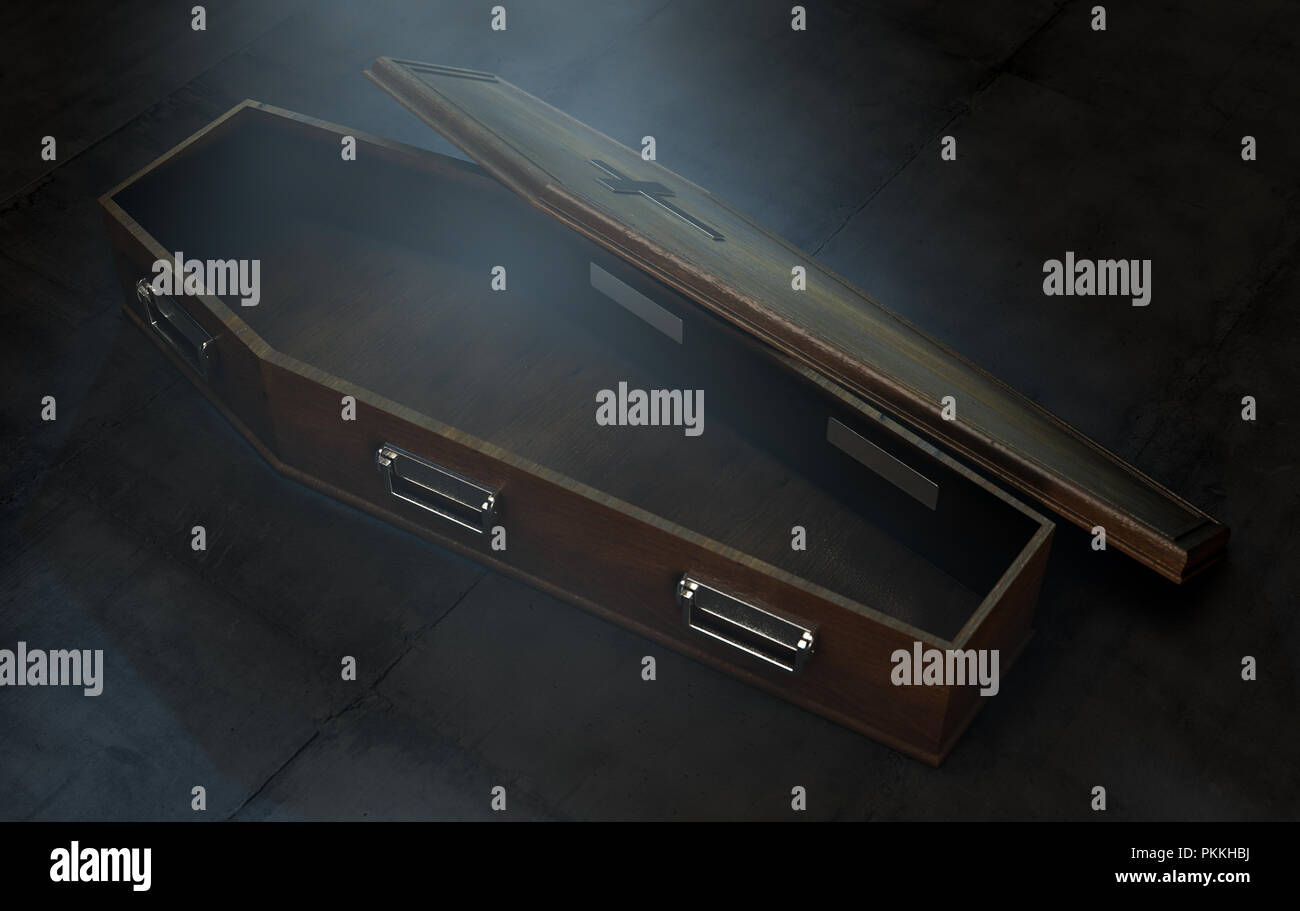 A slightly open empty wooden coffin with a metal crucifix and handles ...