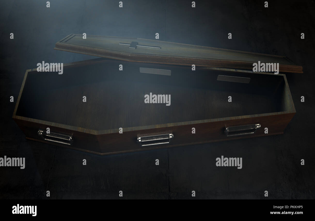 A slightly open empty wooden coffin with a metal crucifix and handles ...