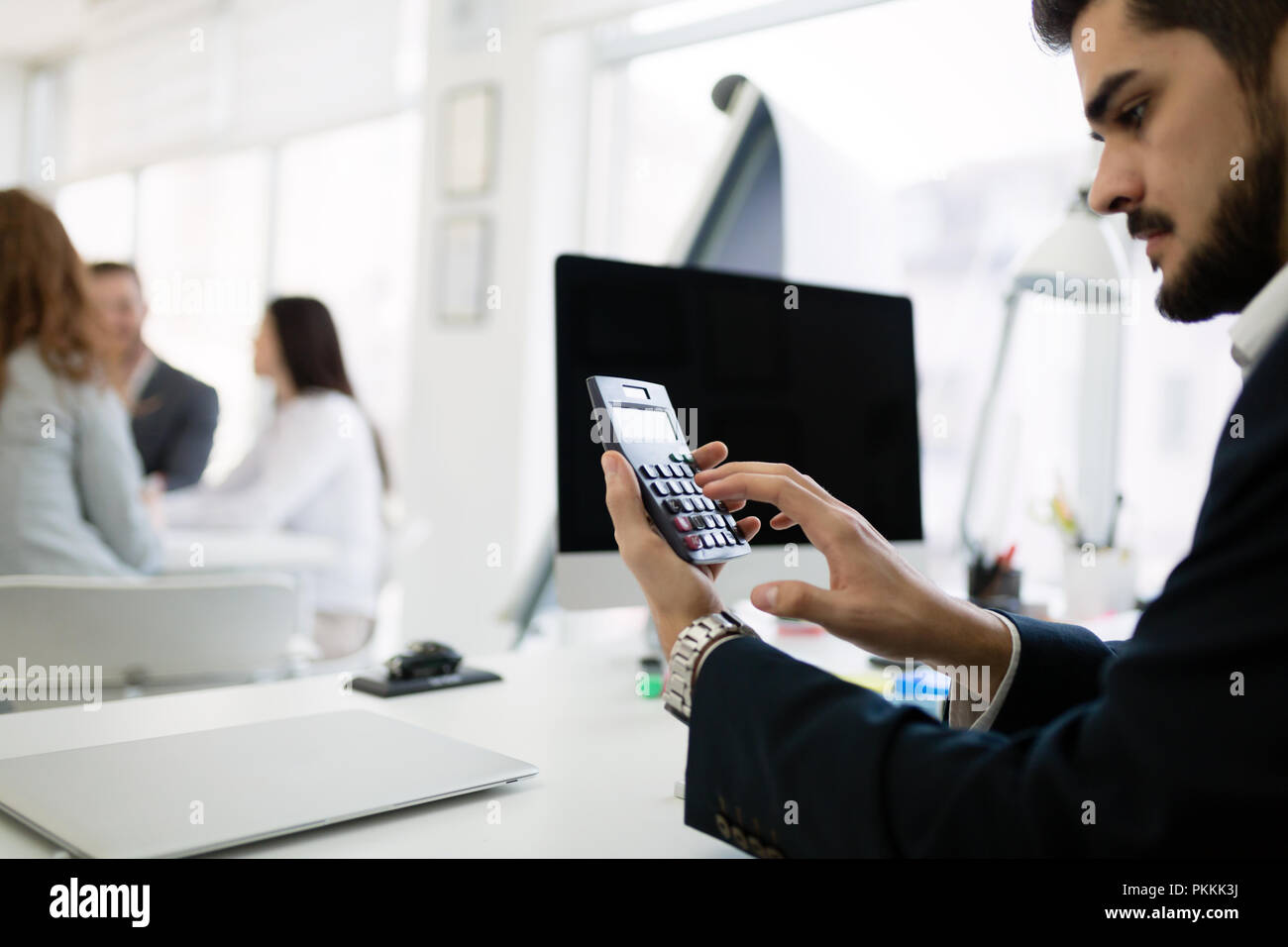 Man desk calculator hi-res stock photography and images - Alamy