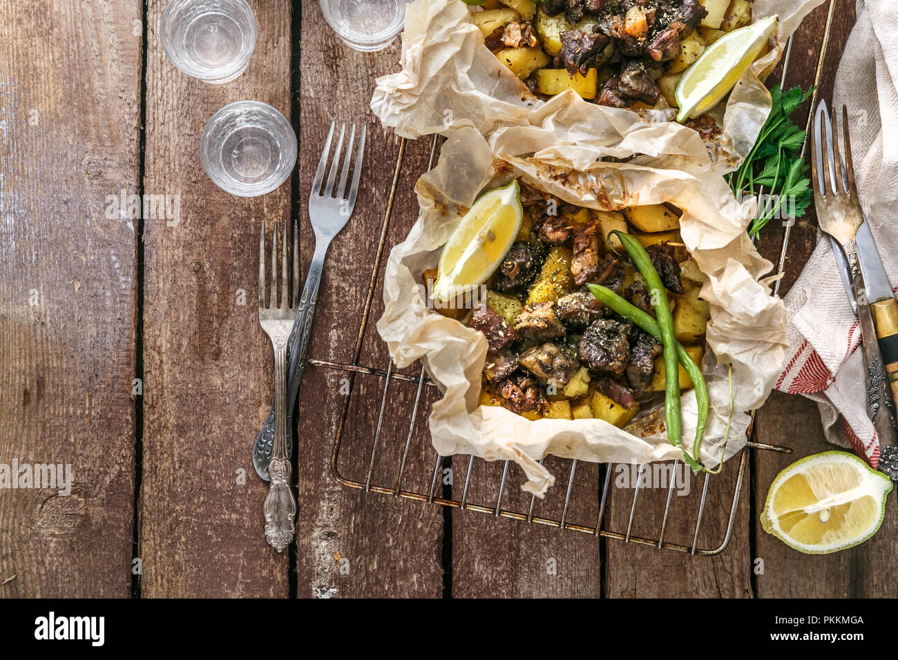 Traditional Greek kleftiko, an oven-baked lamb stew with potato, olive ...