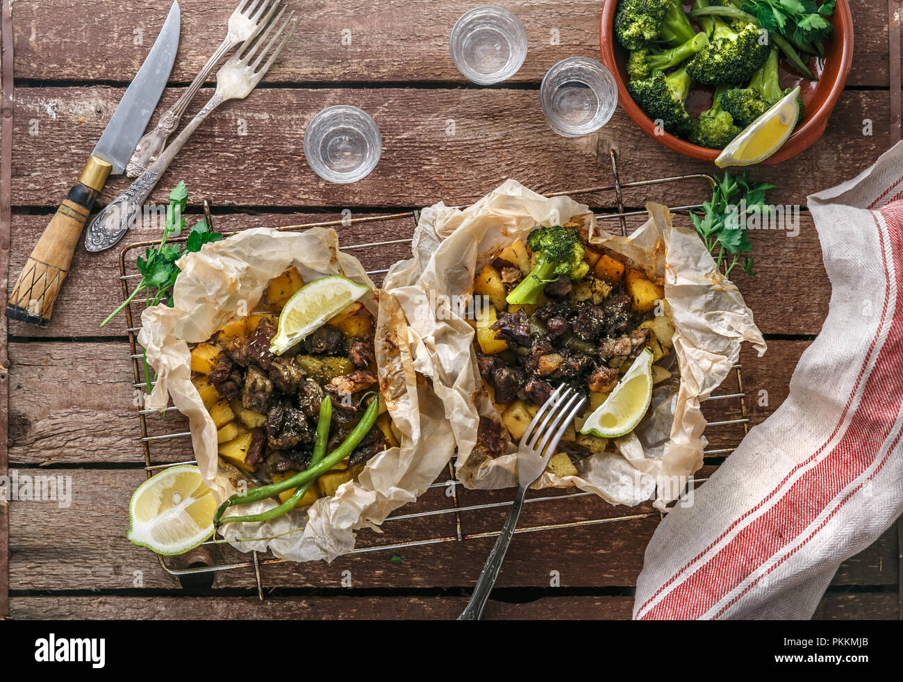 Traditional Greek kleftiko, an oven-baked lamb stew with potato, olive ...