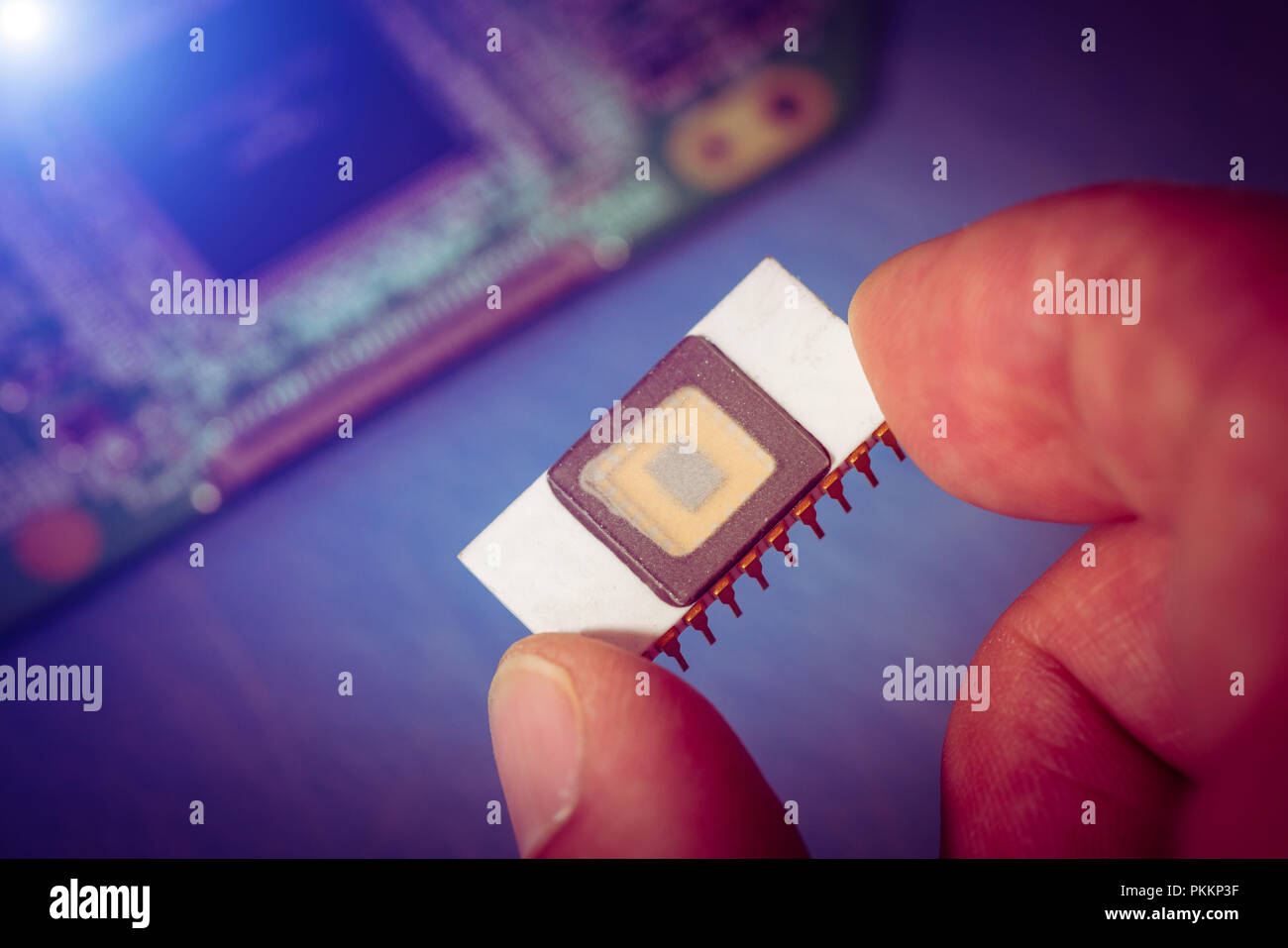 Microprocessor chip, finger hi-res stock photography and images - Alamy