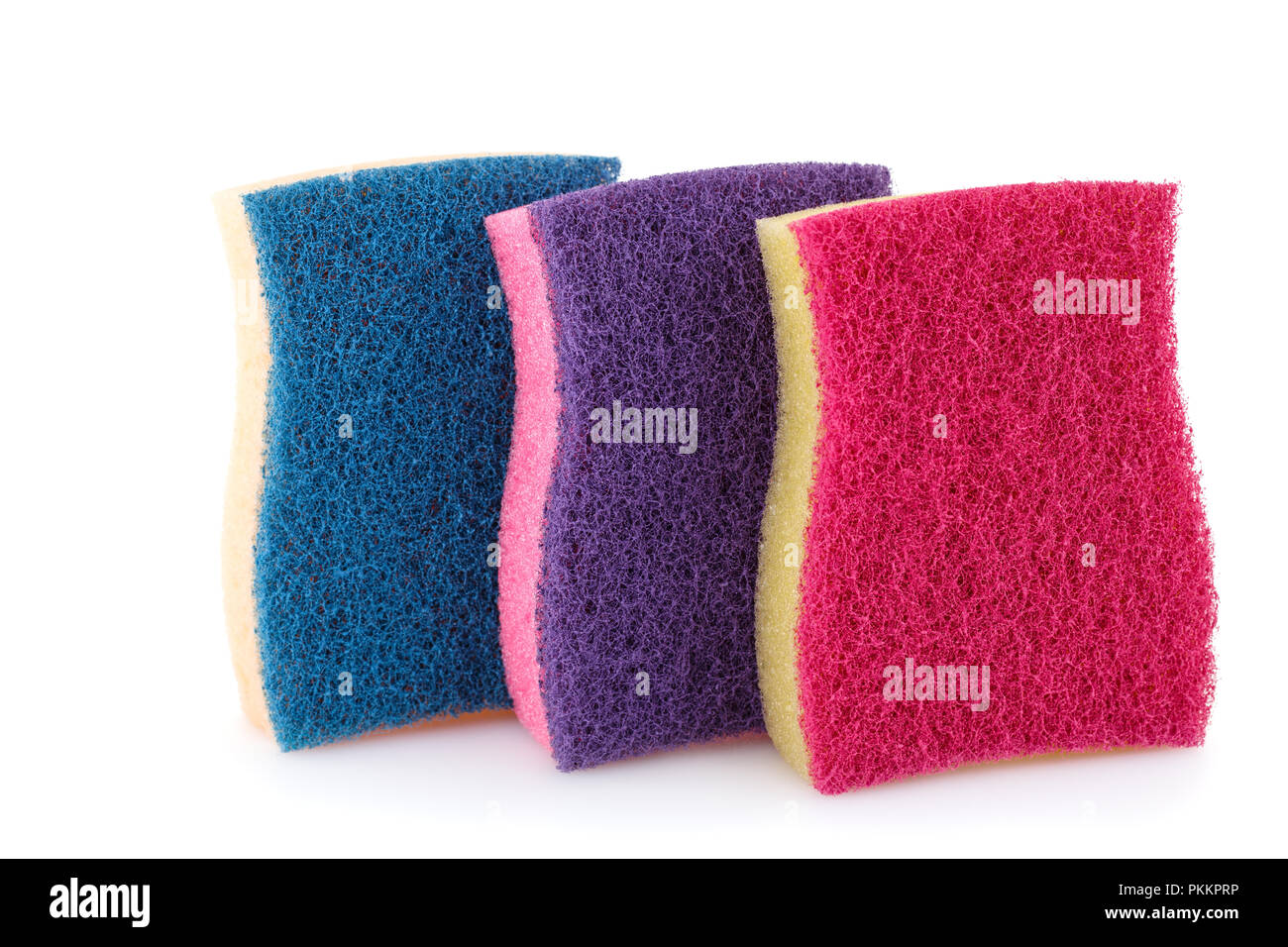 Colorful sponges isolated on white background Stock Photo - Alamy