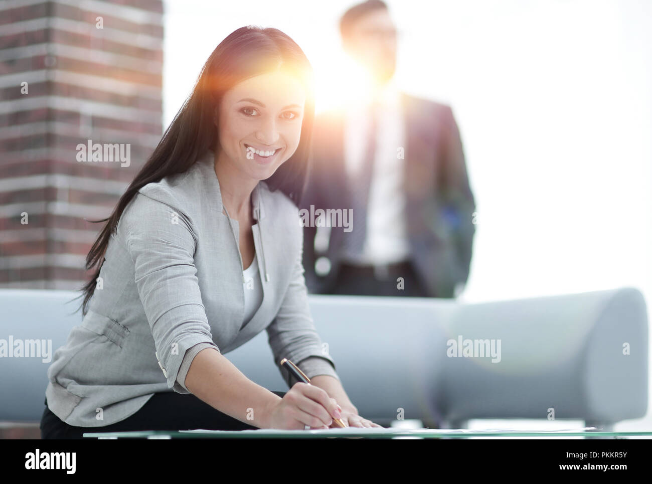 Business lady signs documents hi-res stock photography and images - Alamy