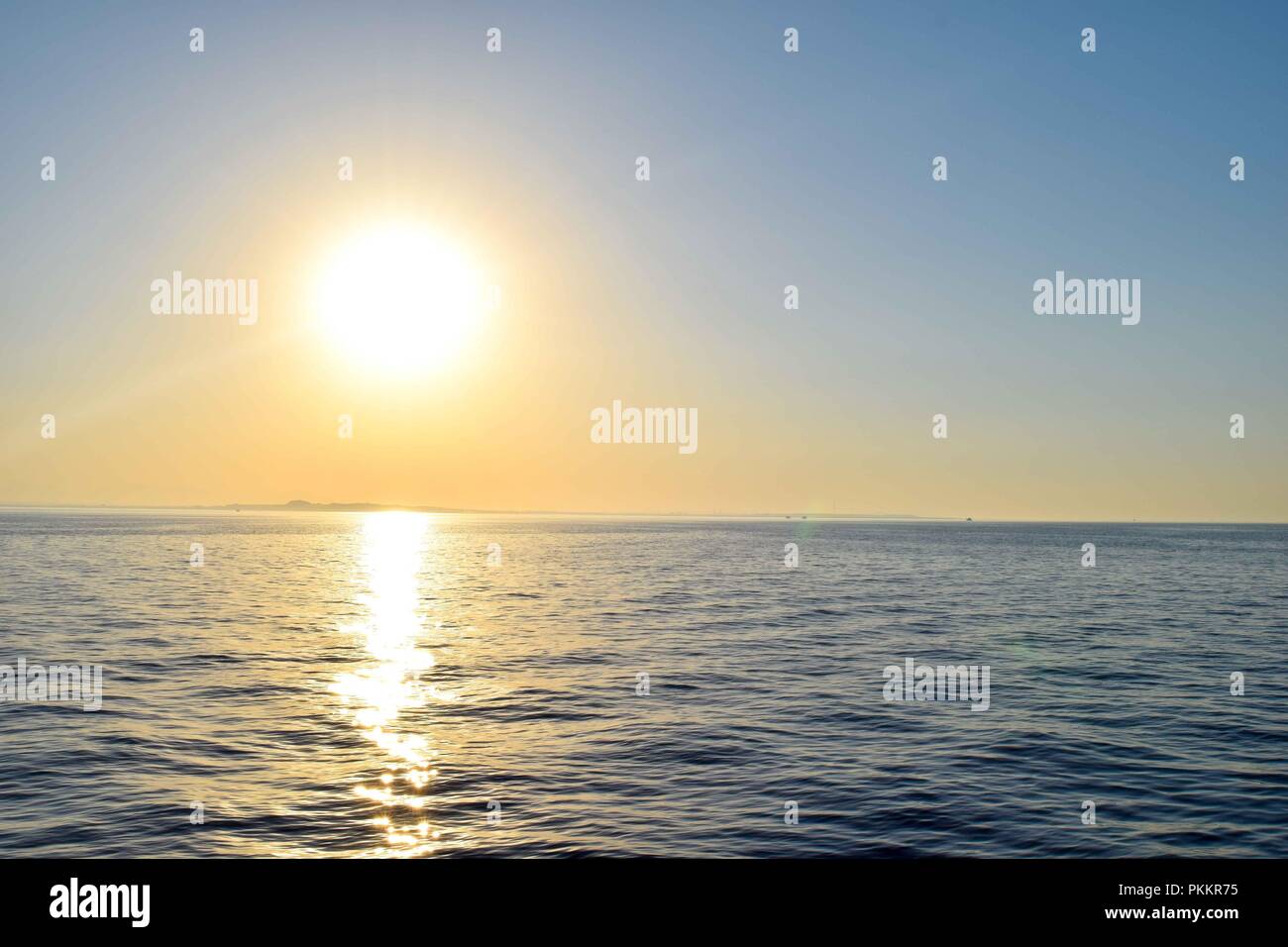 Sunset over the ocean, red sea, beautiful sundown Stock Photo - Alamy