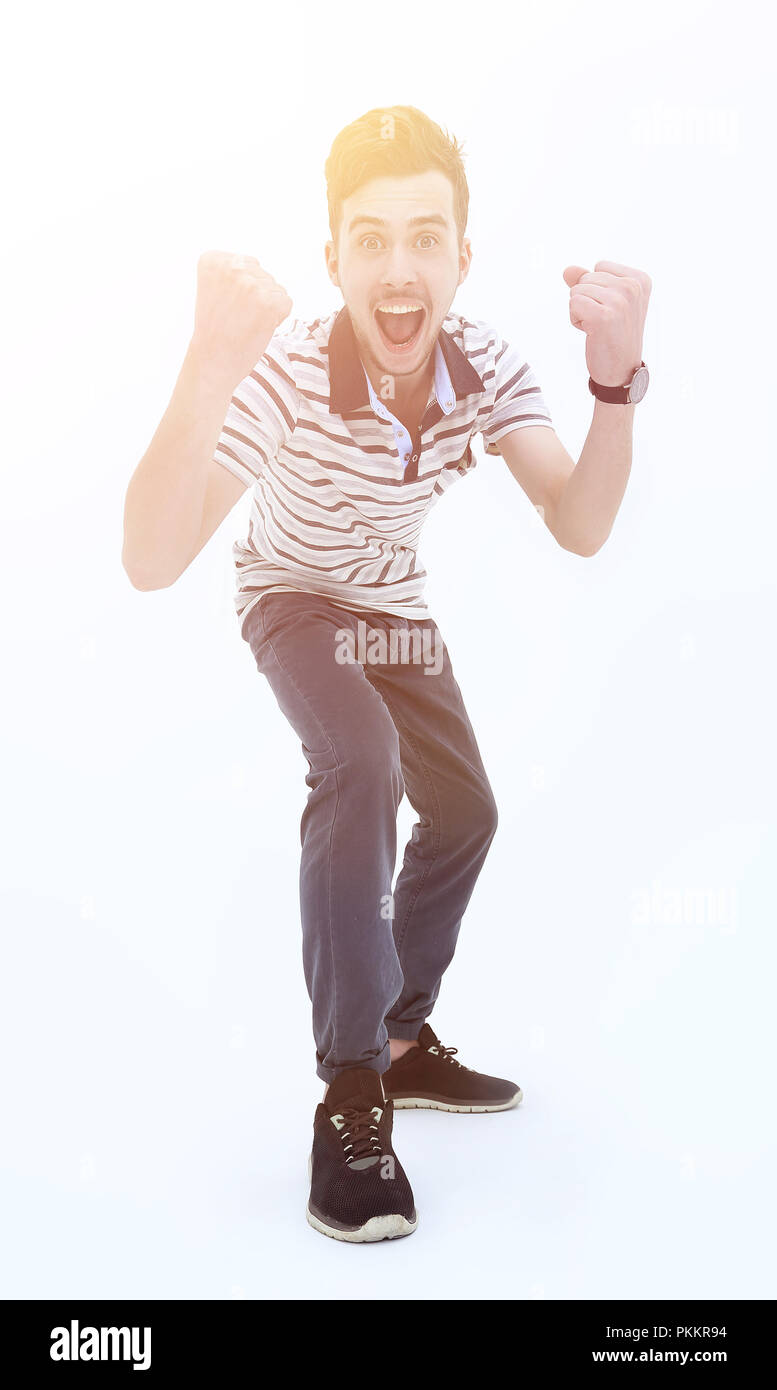 closeup. happy guy celebrating his success Stock Photo - Alamy