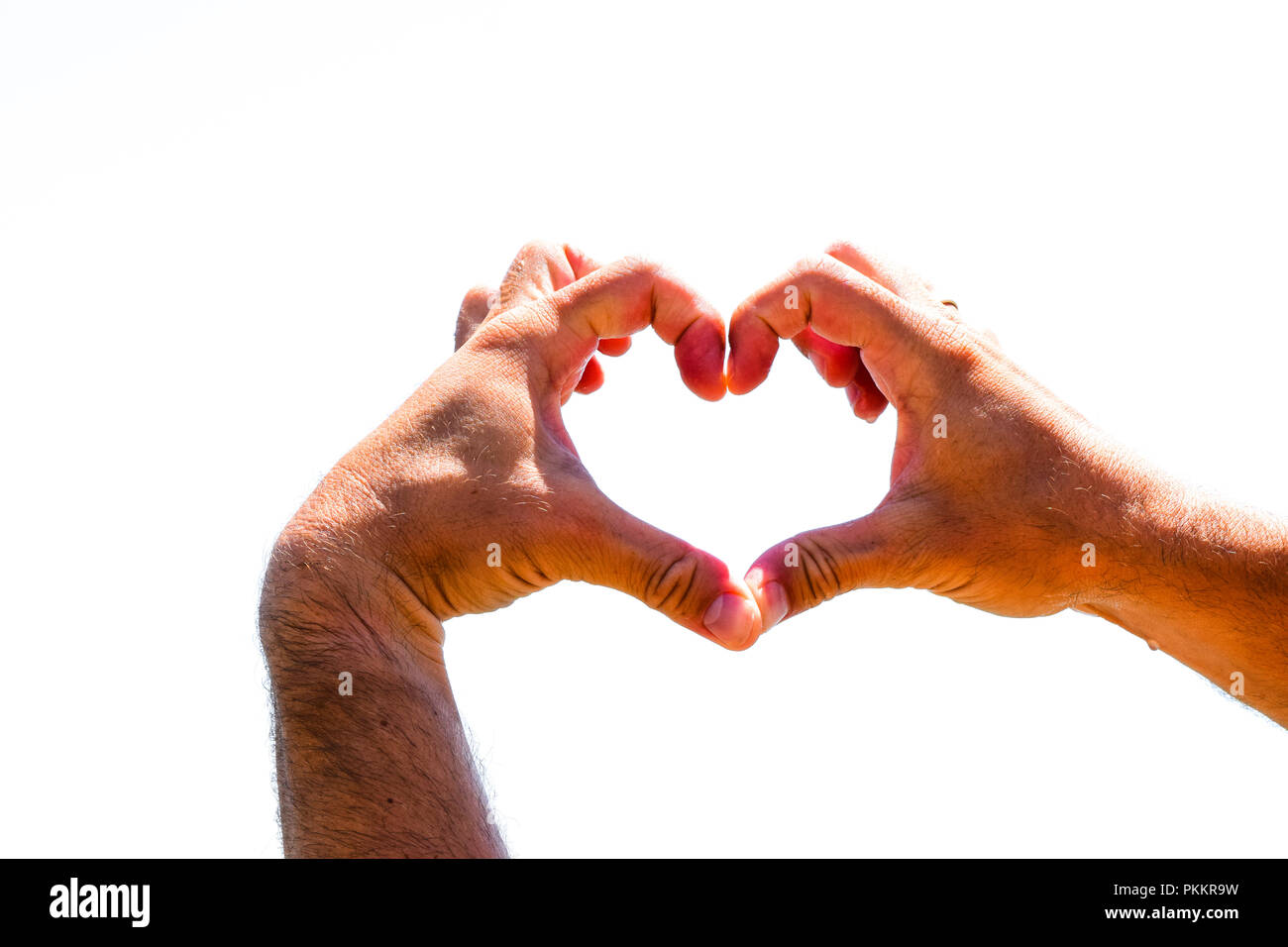 heart shape with man's hand on white background, love sing text card ...