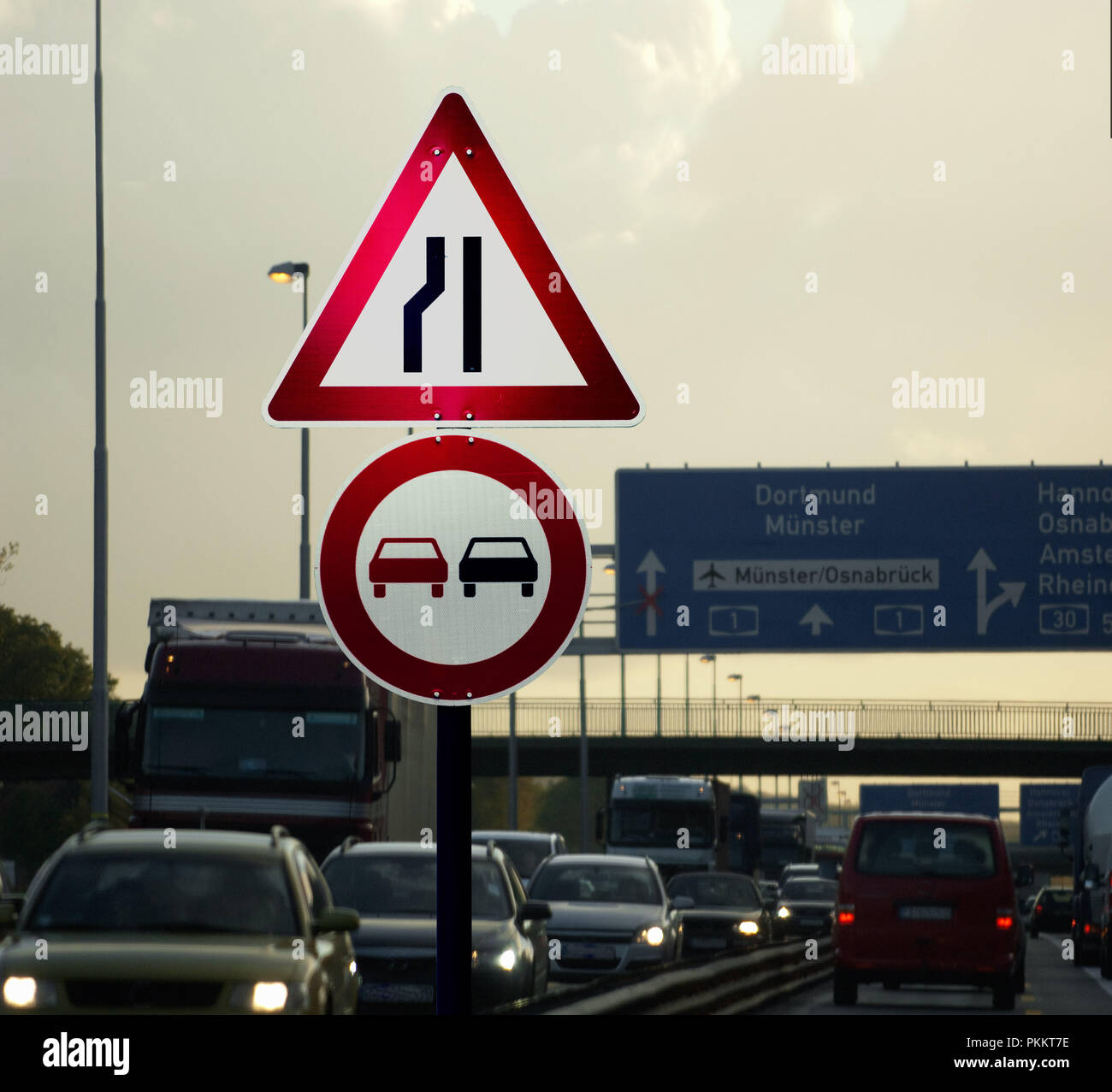 A street sign at the highway in traffic jam Stock Photo - Alamy