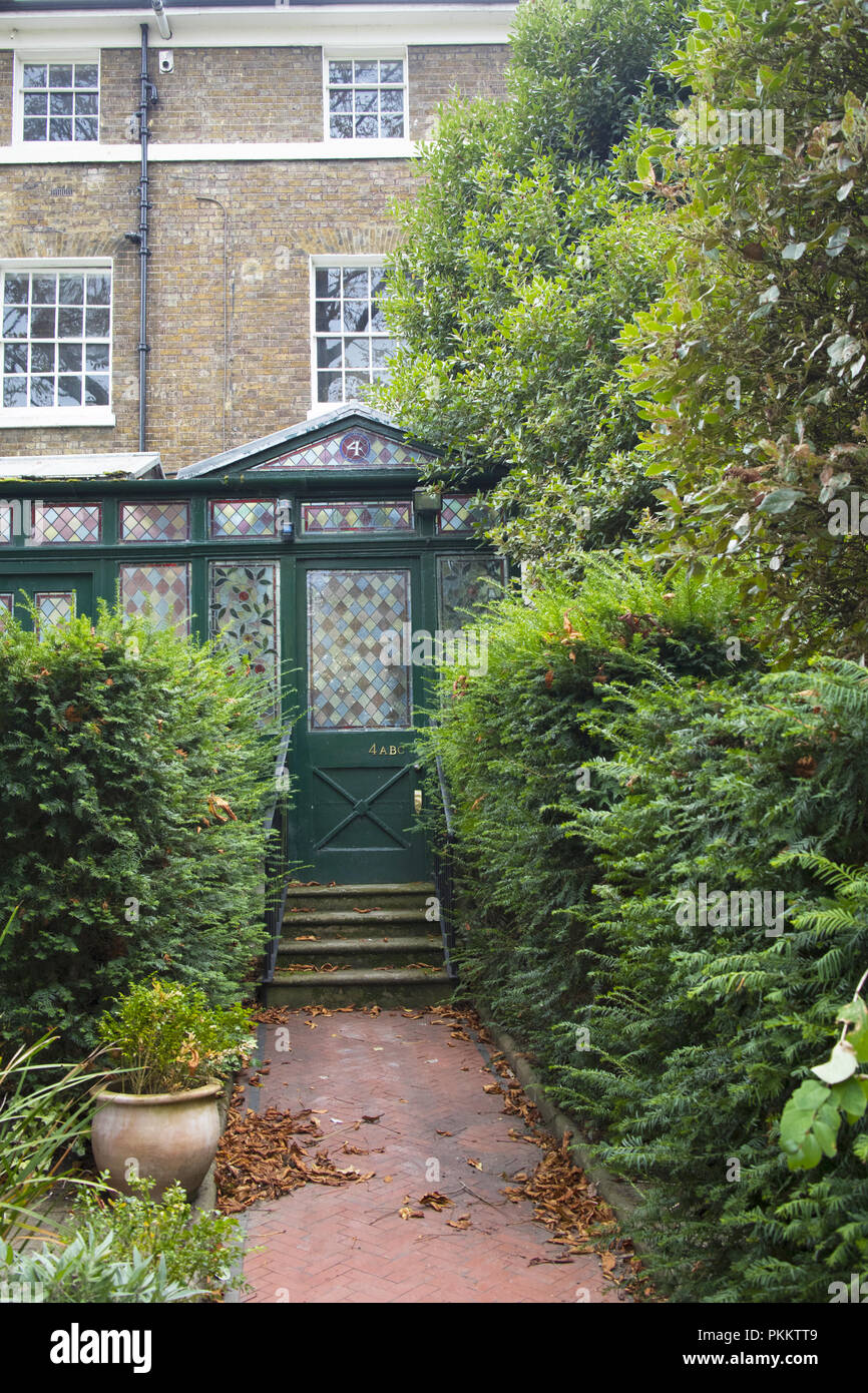 The front of an unusual house in Keat's Grove, with a conservatory ...