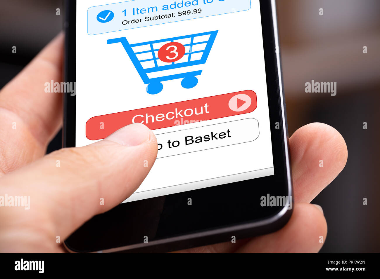 Human Hand Holding Mobile Phone With Online Shopping Application Stock ...