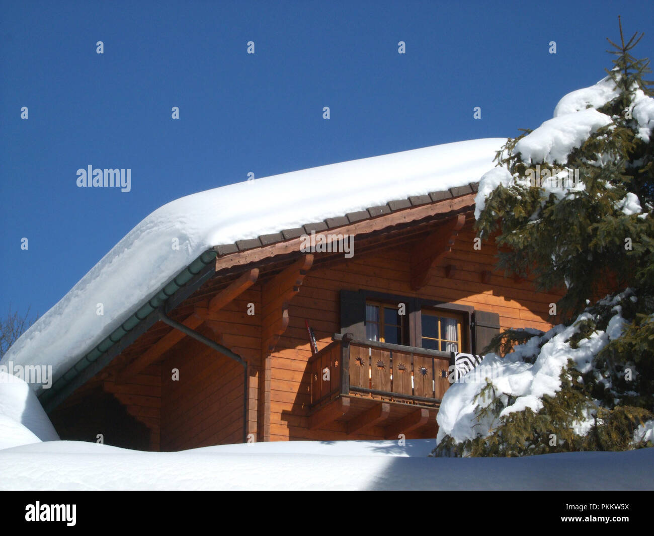 Wooden cottage in Swiss Alps Stock Photo - Alamy