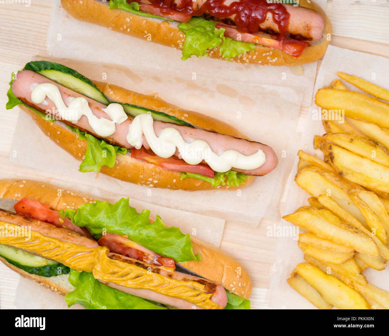 Choice of three different hot dogs with assorted fresh salad trimmings ...