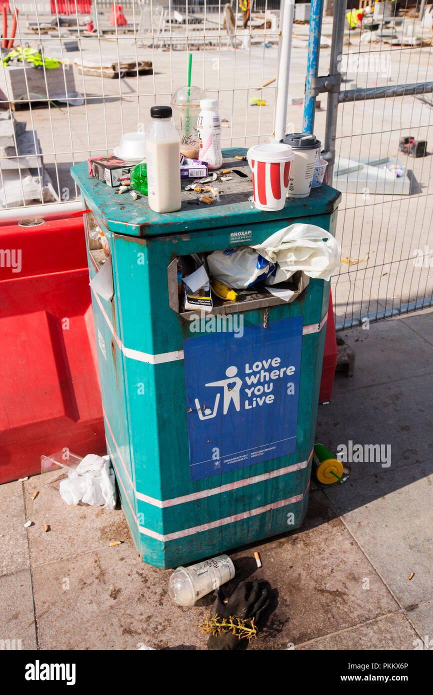 An overflowing litter bin in Cardiff, Wales, UK Stock Photo - Alamy