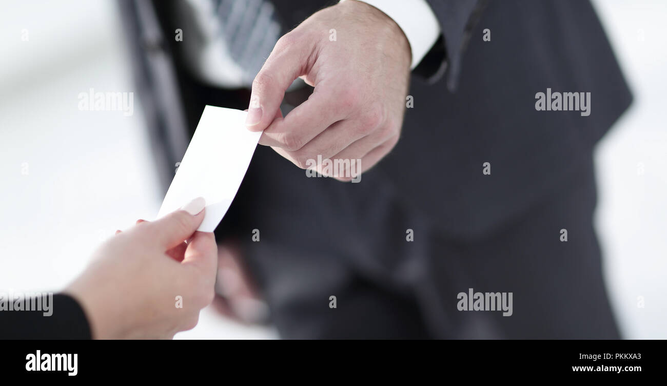 Exchange business card for first time meet Stock Photo - Alamy