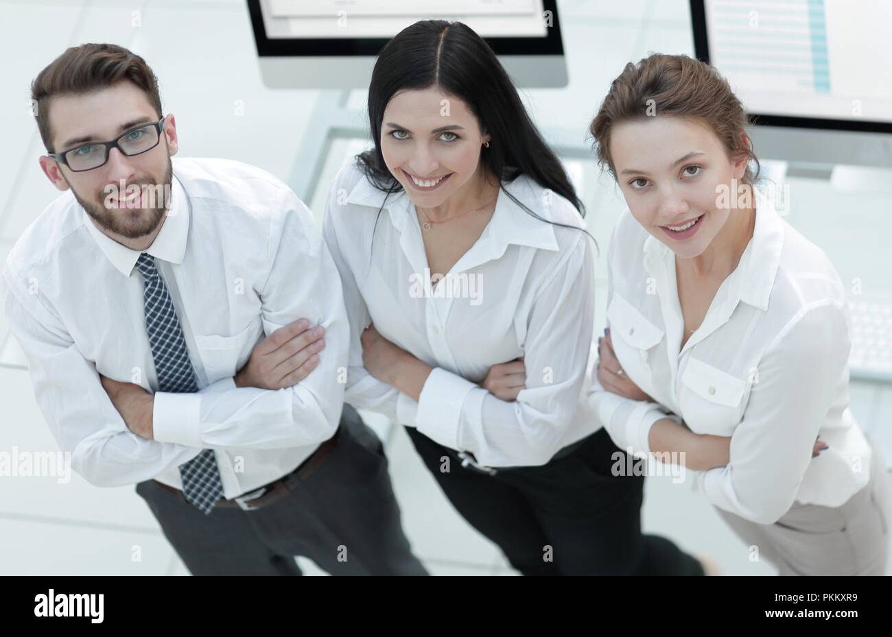 successful business team standing near workplace Stock Photo - Alamy
