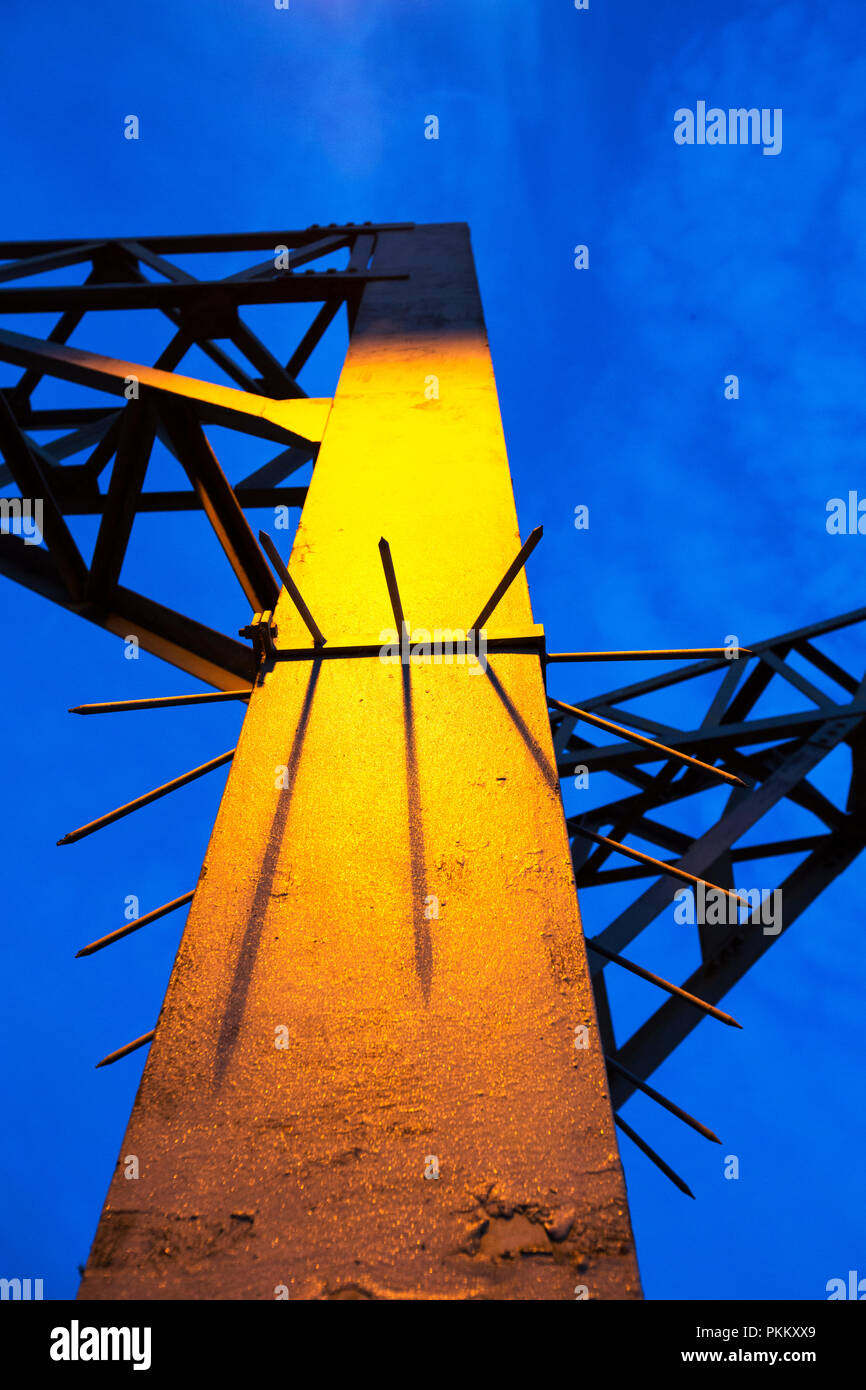 Electric train cables and pylons on Crewe station at sunset, Cheshire ...